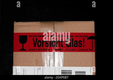 Package with the note on the tape "Caution Glass", Do not drop Stock ...