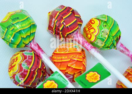 A handful of bright, colorful, popular sucking candy, round candies ...