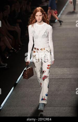 A model walks the runway at the Louis Vuitton show as part of Paris ...