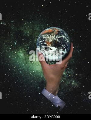 Hand of Man Handing The Earth Stock Photo - Alamy