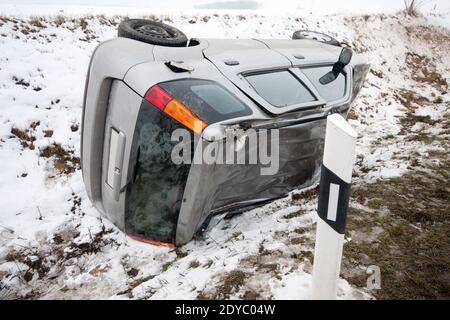 Car Crash and Car Damage; Vehicle upside down in a field after high ...