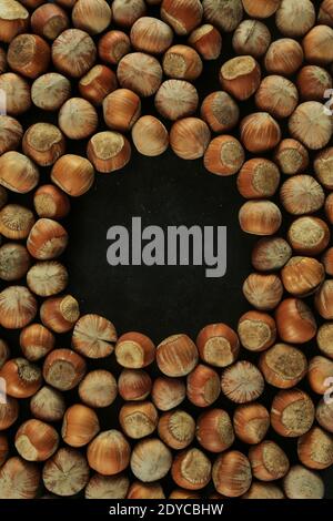 Hazelnuts on wooden backdrop. Hazelnut background. High quality photo ...
