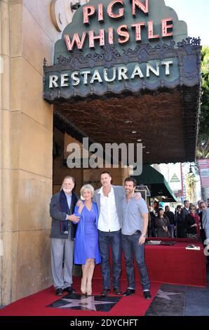 Helen Mirren, posing with her husband Taylor Hackford and his sons Rio ...