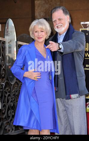 Helen Mirren, posing with her husband Taylor Hackford and his sons Rio ...