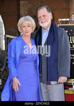Helen Mirren, posing with her husband Taylor Hackford and his sons Rio ...