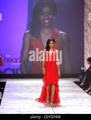 Gabby Douglas attends the 2013 Red Dress Collection at the Hammerstein ...