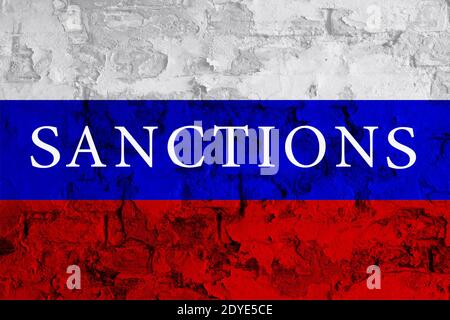 Word SANCTIONS on USA flag Stock Photo - Alamy