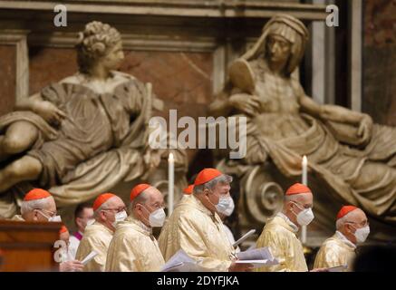 Cardinals attend the Christmas Eve Mass presided over by Pope Francis ...