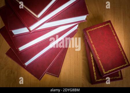classical literature books stack. Same dust jacket Stock Photo - Alamy