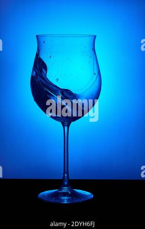 Shaken water in a glass Stock Photo - Alamy