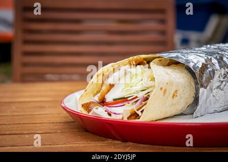 Durum Kebab in a local pizza and gyros restaurant Stock Photo - Alamy