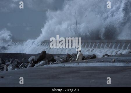 Wave splash. Douro river south pier in a stormy day. Used infrared ...