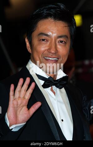 Takashi Miike arriving for 'Wara No Tate' screening held at the Palais ...