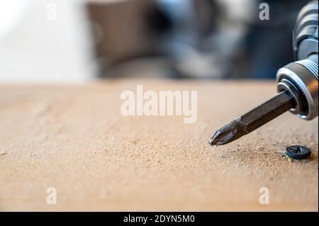 Damaged screw head caused by using the wrong bit and speed to install ...