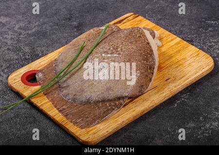 Raw stingray wings tasty fillet for cooking Stock Photo - Alamy