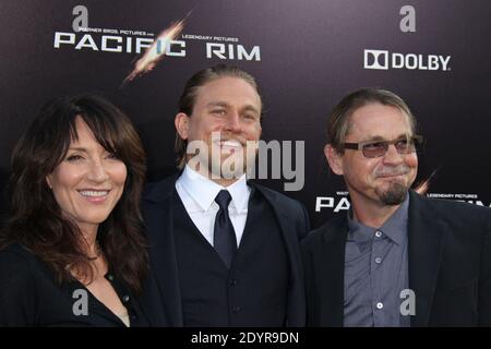 Katey Sagal, Charlie Hunnam, Kurt Sutter attending the Pacific Rim premiere in Los Angeles, CA ...