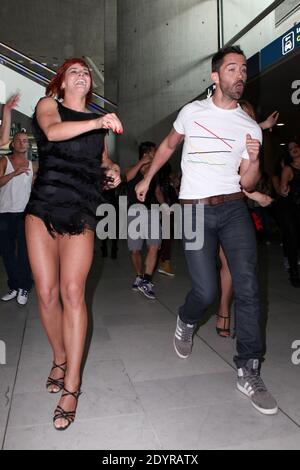 Fauve and Emmanuel Moire performing a flashmob organized by French TV ...