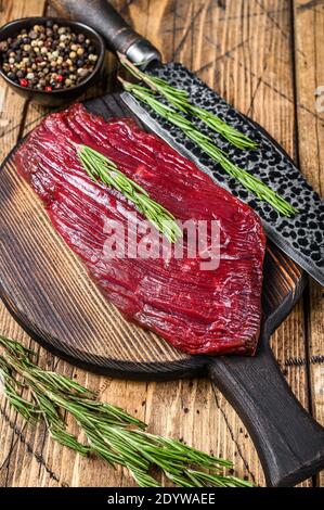 Butcher cutting board with Raw Wild Boar meat, fresh Game Meat Isolated ...