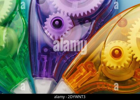 Multi-colored Stationery correction tapes on a blue background. Free ...