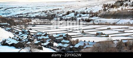 Panoramic view of the village of Gunnerside in snow, Swaledale ...