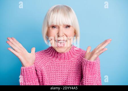 Photo of cheerful lady arms palms hold demonstrate empty space solution ...