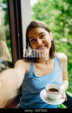 Young woman taking a Covid-19 SARS-CoV-2 test during Corona pandemic on ...