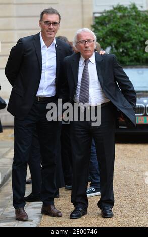 Laurent Blanc and sports journalist Jacques Vendroux arriving at a ...