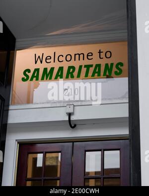An illuminated Samaritans sign, Glasgow, Scotland Stock Photo - Alamy