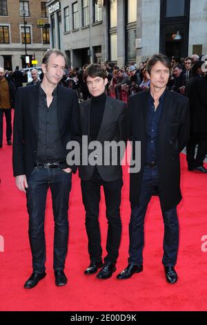 Suede band members, Mat Osman , Neil Codling and Brett Anderson attend ...