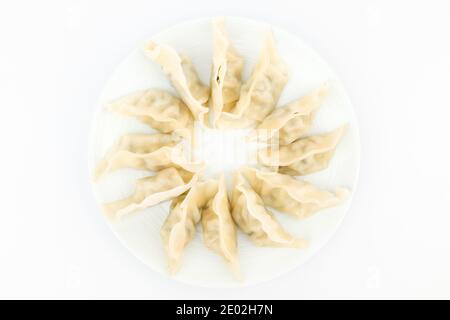 Small dumplings on white background Stock Photo - Alamy