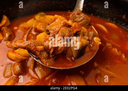 Red pepper paste stew on white background Stock Photo - Alamy