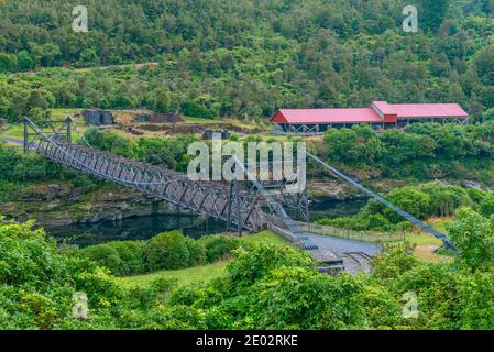 Bridge leading to Brunner Mine Historic Area in New zealand Stock Photo ...