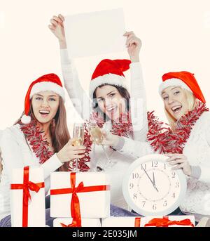 Happy women friends shopping Christmas gifts in the city. People ...