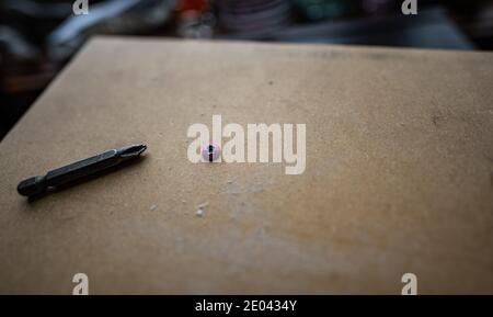 Damaged screw head caused by using the wrong bit and speed to install ...