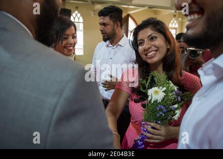 Kerala, India, 08-12-2017. Bride and groom closer to the altar ...