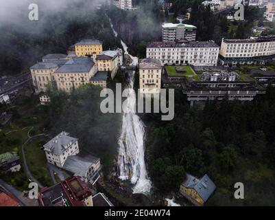 Aerial view of Gasteiner Ache waterfall in tourist spa town Bad Gastein ...