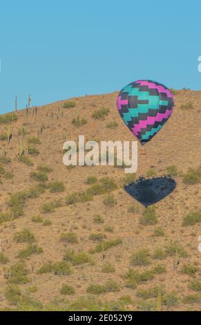 Peaceful flight over sunny Arizona in a brightly colored Hot Air ...
