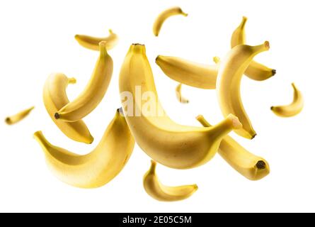 Yellow bananas levitate on a white background Stock Photo - Alamy