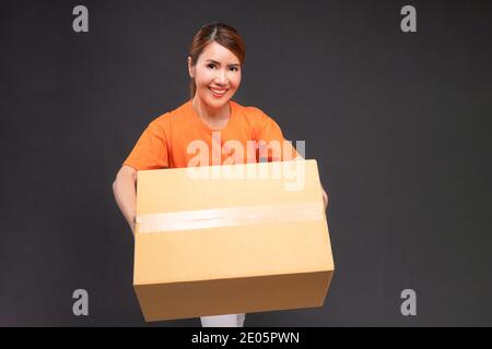 Woman in white uniform holds clipboard and pen, sings with open mouth ...