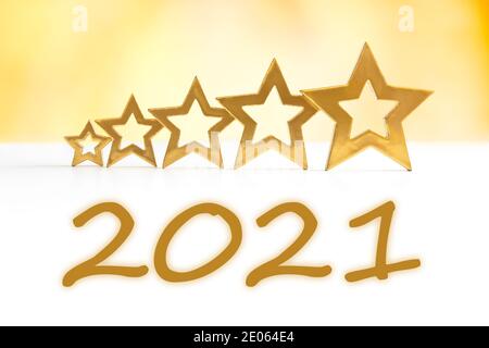 Better New Year concept. Golden 2021 text on a sparkling background ...