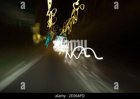 Drivers view through windscreen of headlights, distorted blurry fuzzy ...