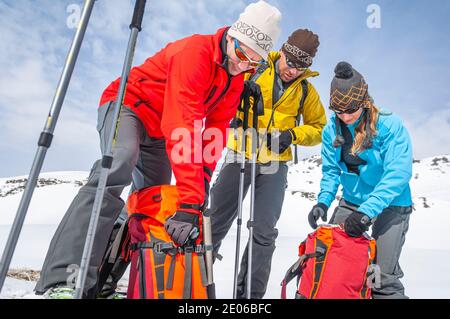 Preparing for a ski-tour in high alpine region Stock Photo - Alamy