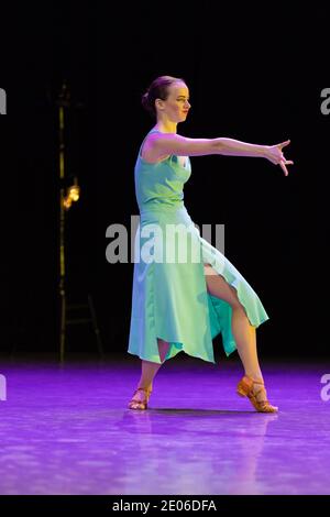 Dancer actresses young woman performs on theatrical scene in the ...