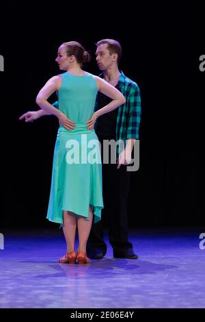 Team Actors dancers perform in the theater on stage in a retro musical ...