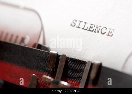 Silence word written with a typewriter Stock Photo - Alamy