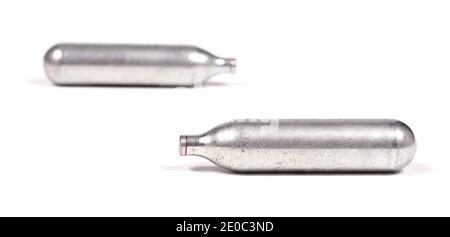Empty canister of laughing gas, isolated on white Stock Photo - Alamy
