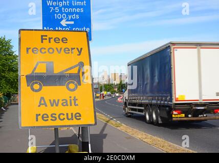Free recovery await rescue roadworks sign on the M3 in Surrey, England ...