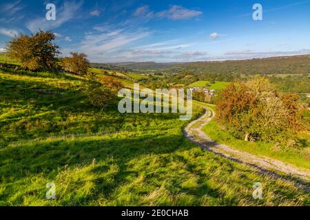 View of Calver Village overlooked by Curbar Edge, Calver, Derbyshire ...