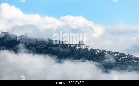 Stunning panoramic view of Veroli town with snow capped mountains in ...
