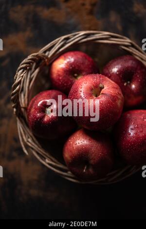 basket with apples on a wet table Stock Photo - Alamy